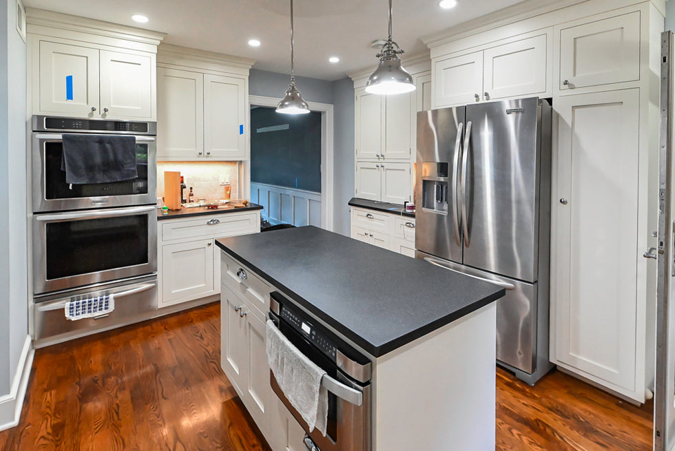 Custom Traditional White Kitchen with Stone Countertops and Appliances ...